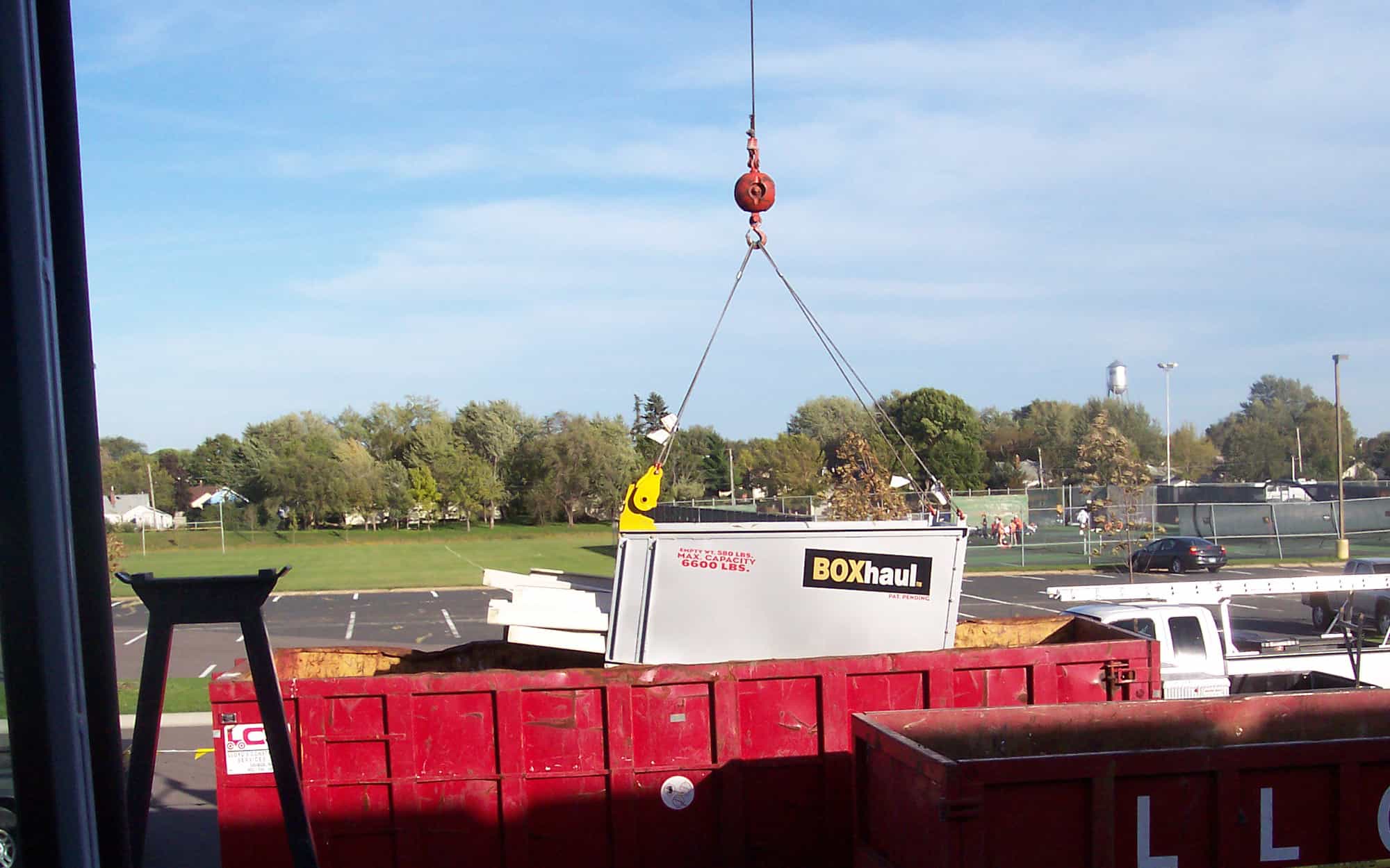 How Self-Dumping Boxes Reduce Labor Costs